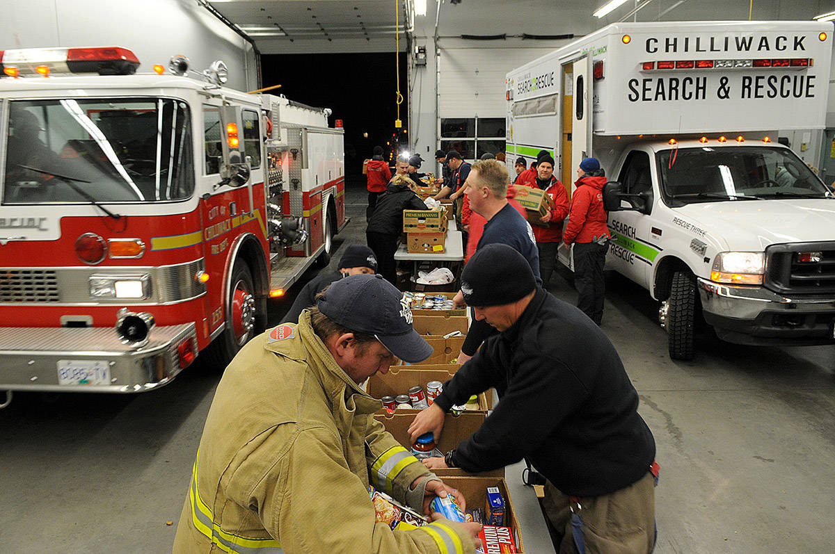 First responders help stock food bank shelves - The Chilliwack Progress