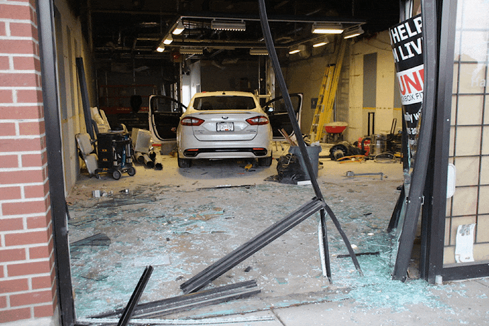 Video Car Crashes Through Surrey Shop Window Nearly Hits Construction