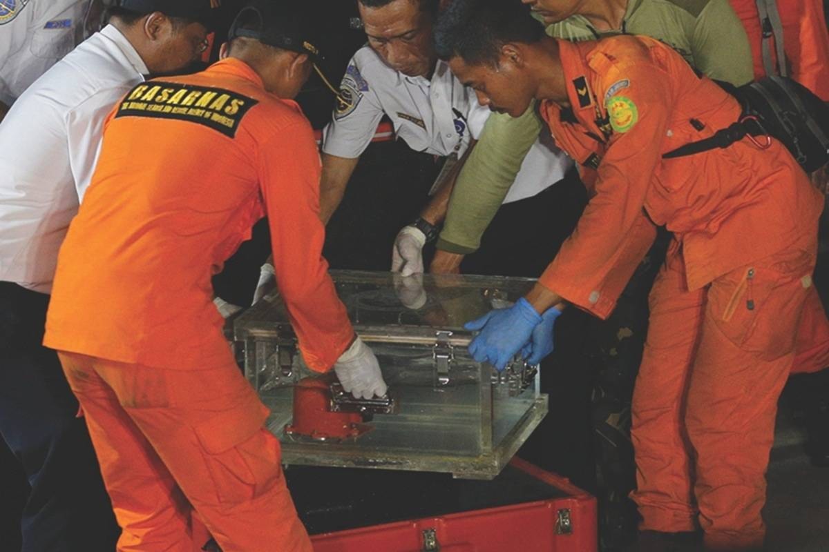 Divers recover jet flight recorder from Indonesia seafloor - Red Deer ... Divers recover jet flight recorder from Indonesia seafloor - Red Deer ...