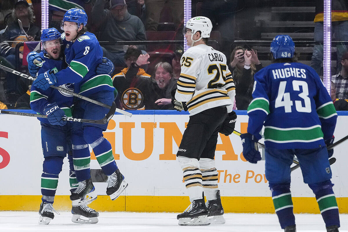 Boeser scores OT winner as Canucks rally to edge Boston Bruins 3-2 - Saanich News